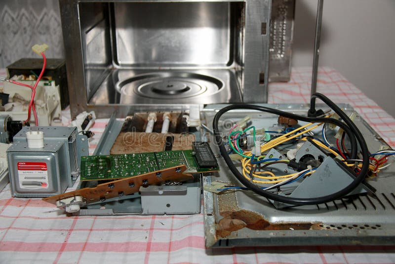 Microwave Oven Disassembled on a Kitchen Table Stock Image - Image of ...