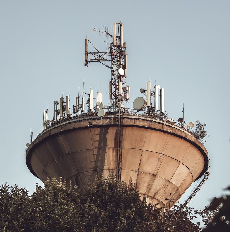 Microwave Transmitter Antennas on Water Tower Stock Photo - Image of ...