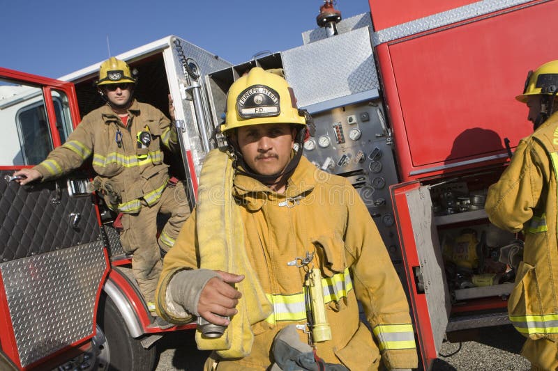Portrait of a Firefighter Holding Axe Stock Image - Image of ethnicity ...