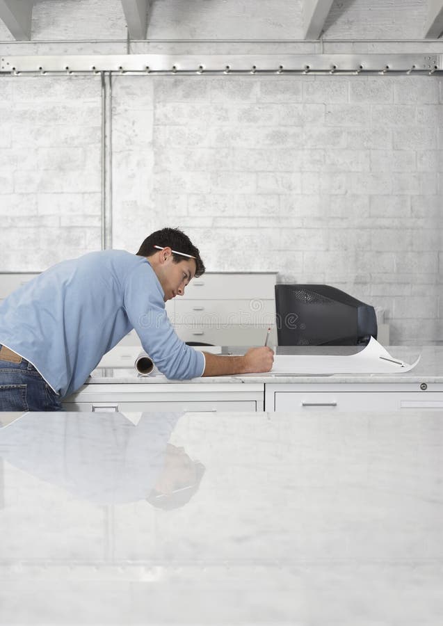 Mid Adult Man Drawing on Sheet of Paper Side View Stock Image - Image ...