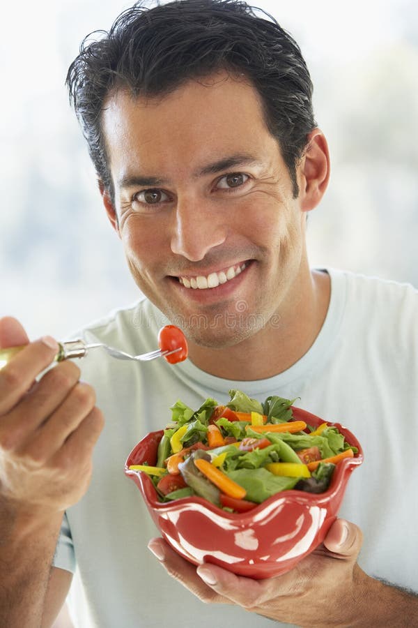 Mid Adult Man Eating Fresh Fruit Salad Stock Photo - Image of adult ...