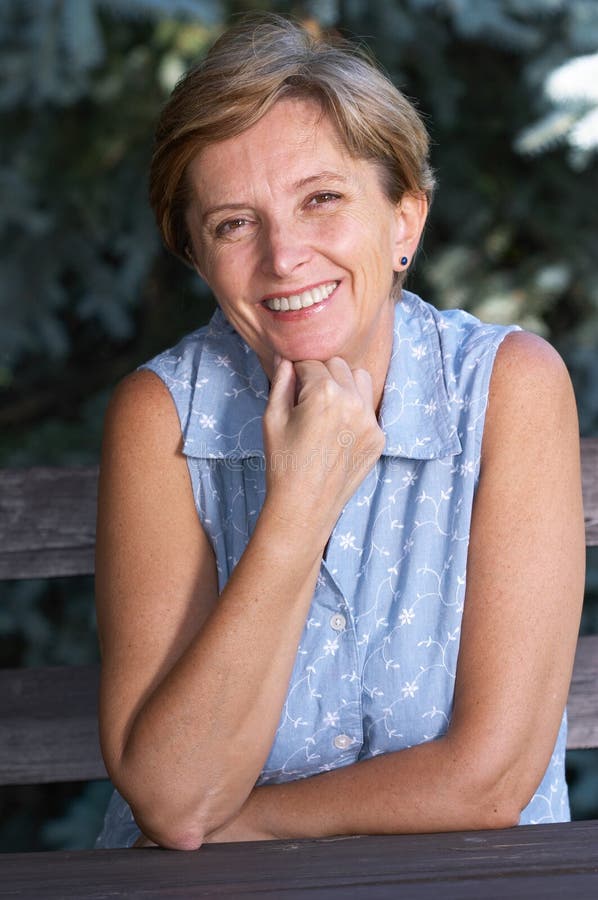 Smiling mid adult woman stock photo. Image of boomer, mature - 2514694