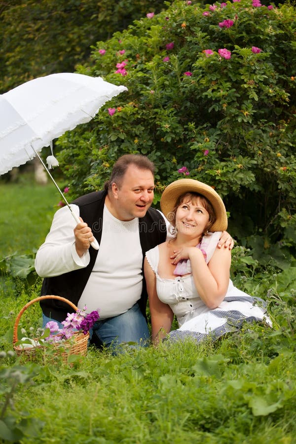 Mid Aged Plus Size Couple Posing in Retro Style Over Dark Background ...