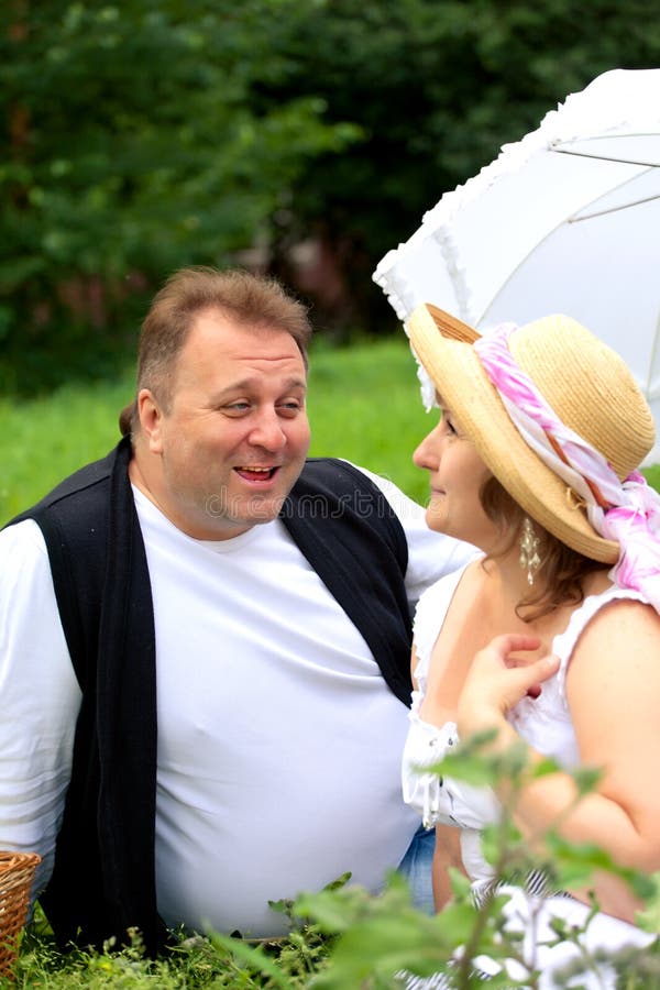 Mid Age Plus Size Couple Having Date in the Park. Sunny Day Stock Image ...