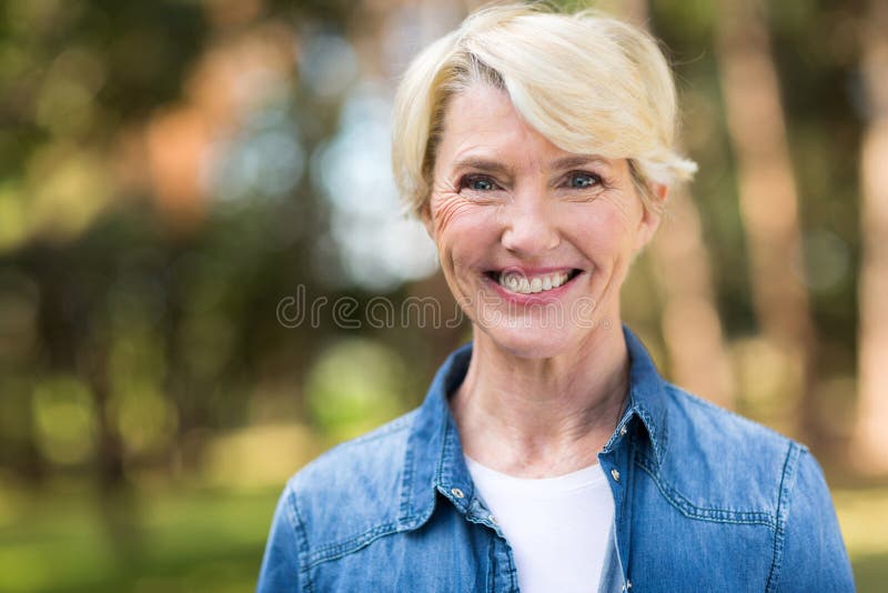 Mid age woman outdoors stock image. Image of close, beautiful - 55351145