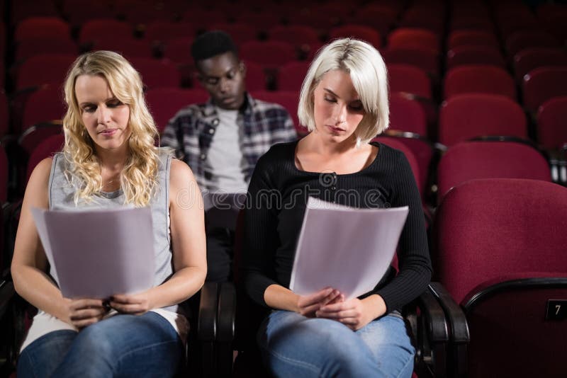 Actors Reading Their Scripts on Stage in Theatre Stock Photo - Image of ...