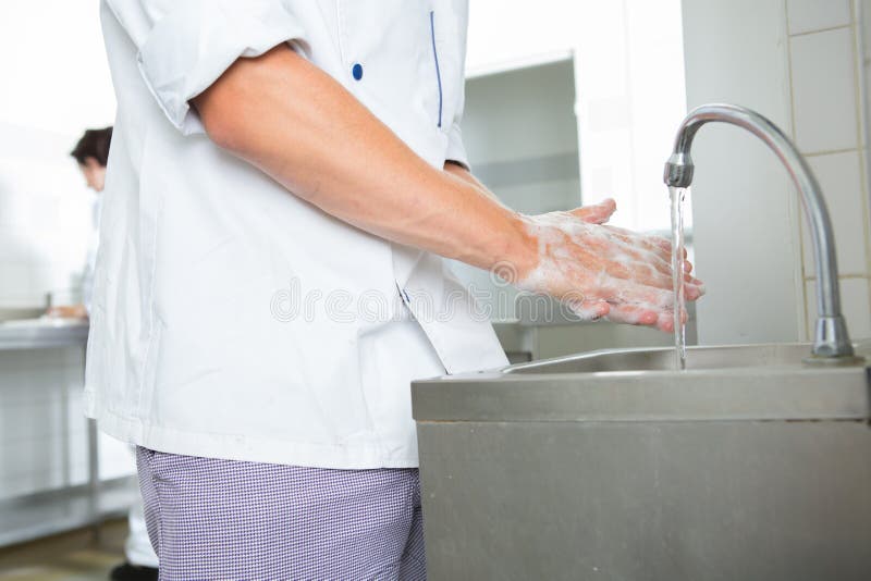 Mid Section Chef Washing Hands Stock Photo - Image of health, arms ...