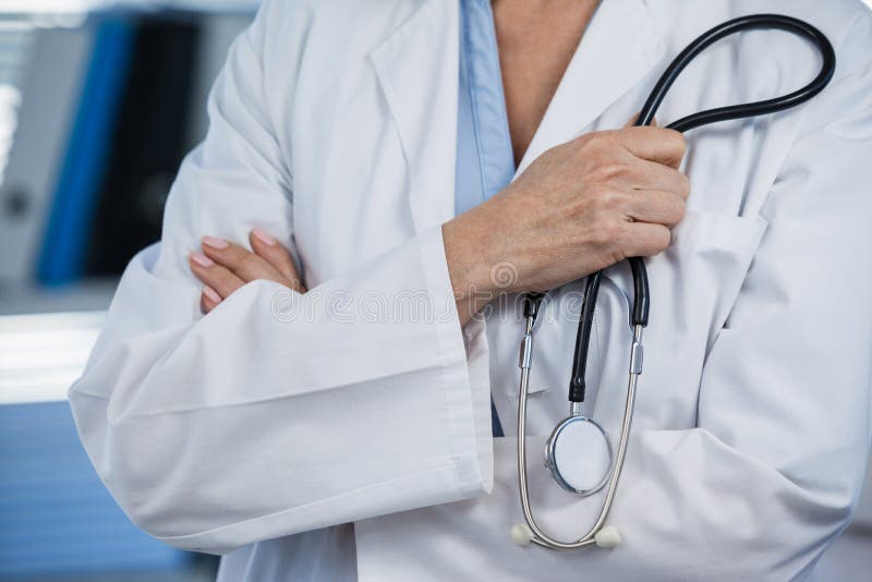 Mid-section of Doctor Holding Stethoscope Stock Image - Image of ...