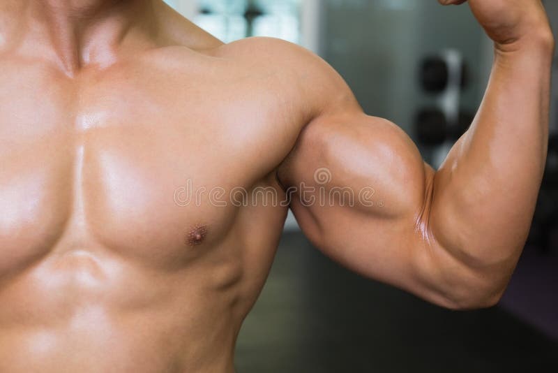 Mid Section of Muscular Man Flexing Muscles Stock Photo - Image of ...