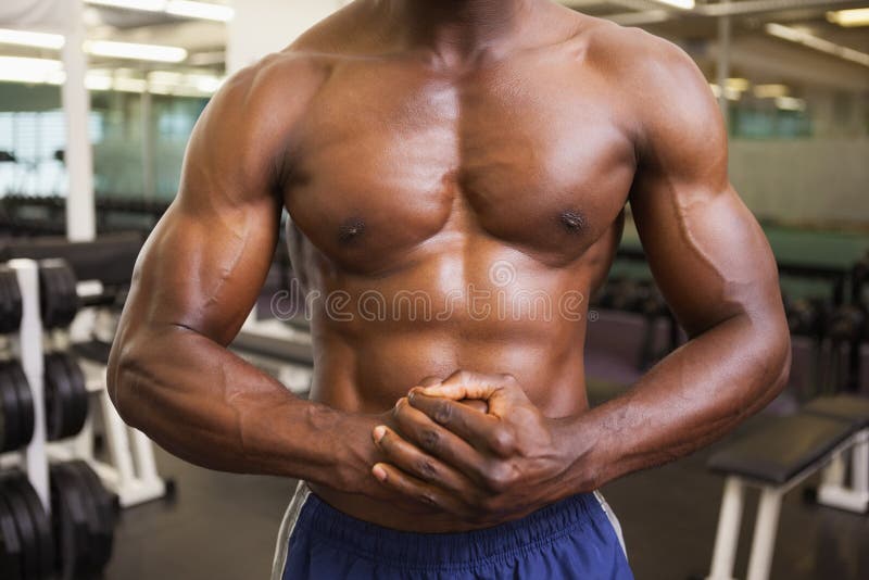 Mid Section of a Shirtless Muscular Man in Gym Stock Image - Image of ...