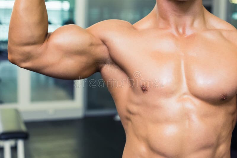 Mid Section of a Shirtless Muscular Man in Gym Stock Photo - Image of ...