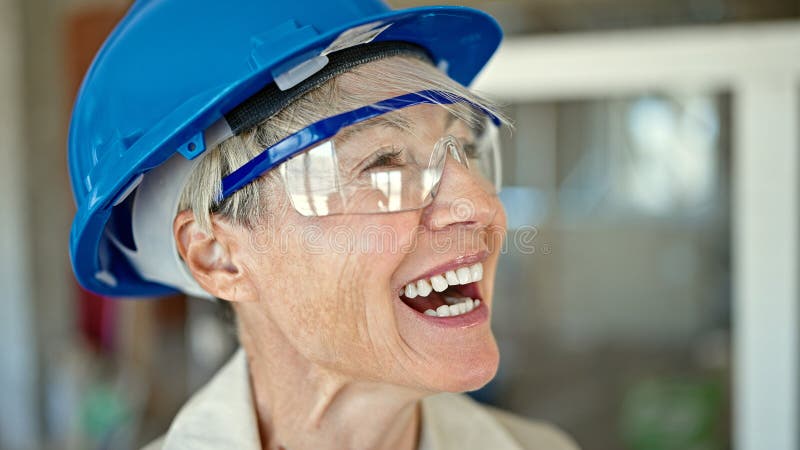 Middle Age Blonde Woman Architect Smiling Confident Standing at ...