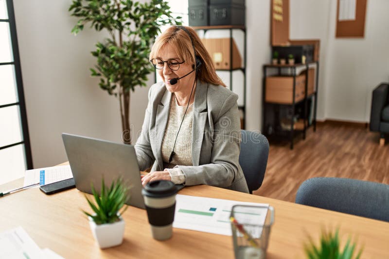 Middle Age Call Center Agent Working at the Office Stock Image - Image ...