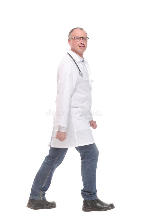 Middle Age Doctor with Stethoscope Walking on White Background Stock ...