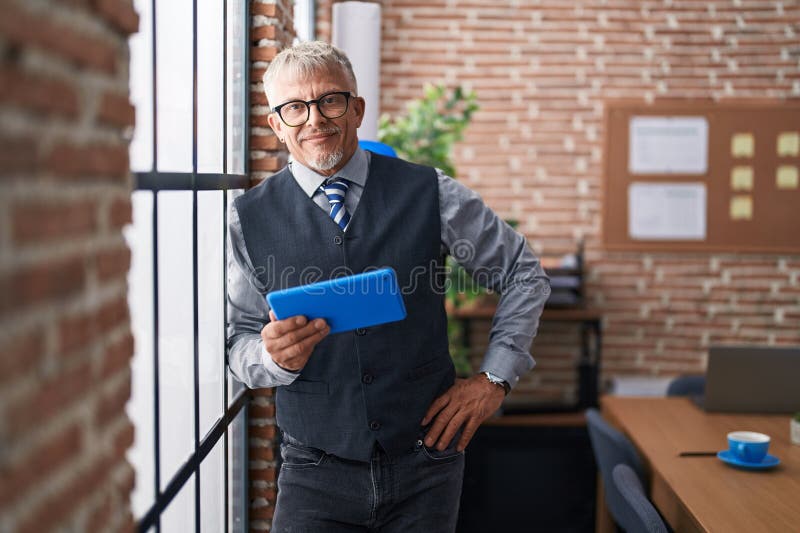 Middle Age Grey-haired Man Business Worker Using Touchpad at Office ...