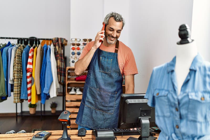 Middle Age Grey-haired Man Shop Assistant Using Computer Talking on ...