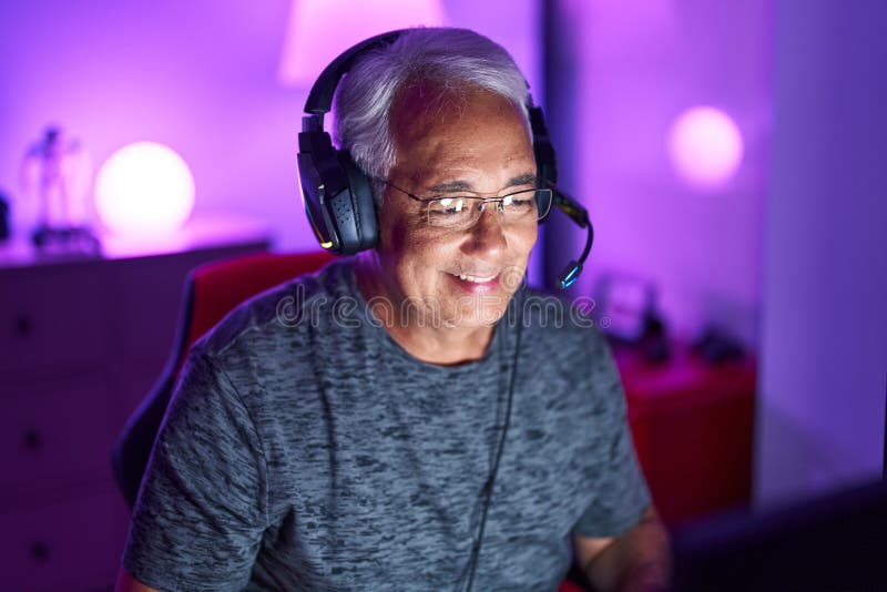 Middle Age Grey-haired Man Streamer Playing Video Game Using Computer ...