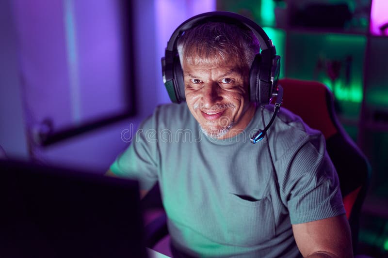 Middle Age Grey-haired Man Streamer Playing Video Game Using Computer ...