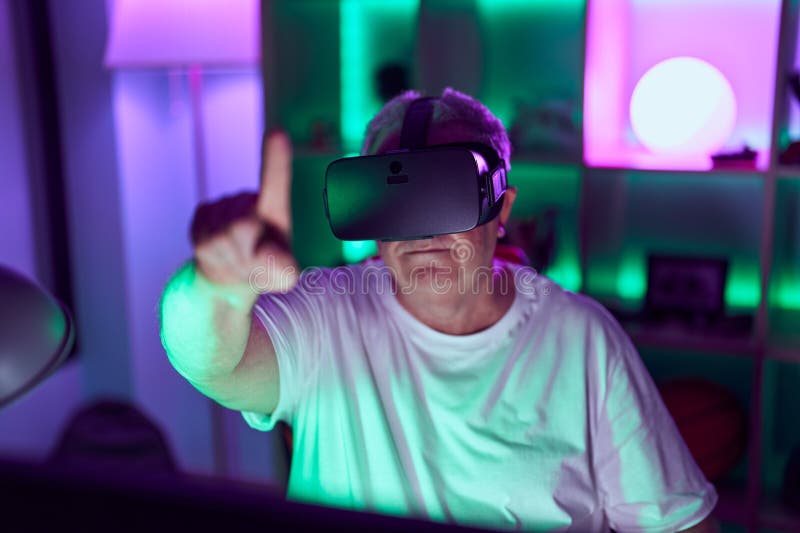 Middle Age Grey-haired Man Streamer Playing Video Game Using Virtual ...
