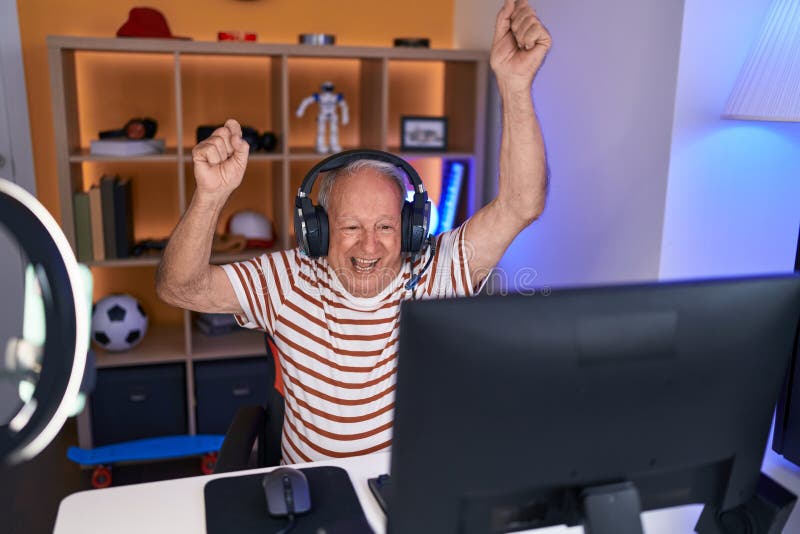 Middle Age Grey-haired Man Streamer Playing Video Game with Winner ...