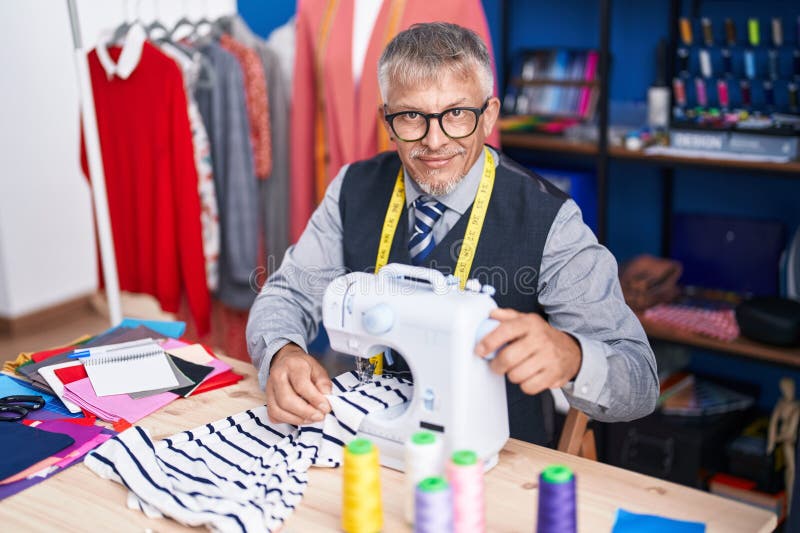 Middle Age Grey-haired Man Tailor Smiling Confident Using Sewing ...