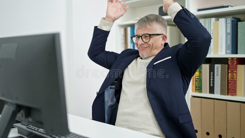 Middle Age Grey-haired Man Teacher Using Computer with Winner ...
