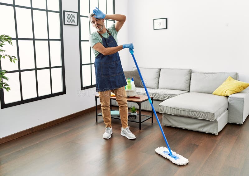 Middle Age Grey-haired Man Tired Cleaning Floor at Home Stock Image ...