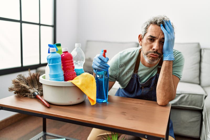 Middle Age Grey-haired Man Tired Cleaning Table at Home Stock Photo ...