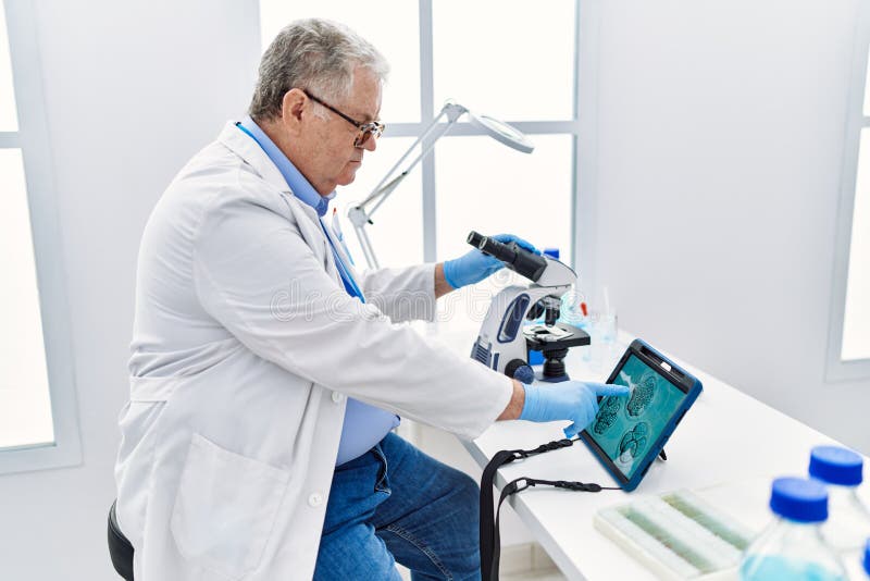 Middle Age Grey-haired Man Wearing Scientist Uniform Looking Embryology ...