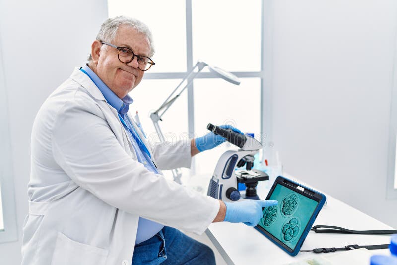 Middle Age Grey-haired Man Wearing Scientist Uniform Looking Embryology ...
