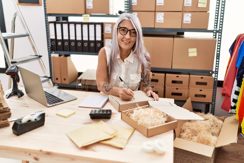 Middle Age Grey-haired Woman Business Ecommerce Worker Writing on ...