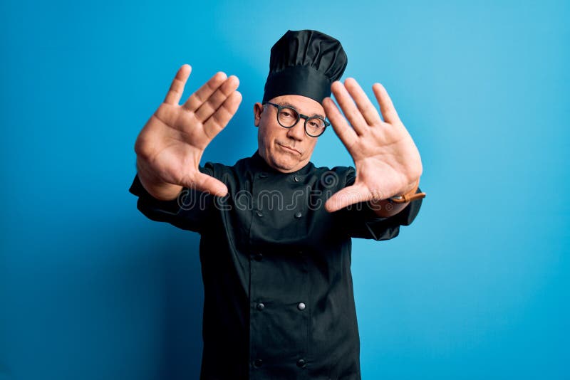 Middle Age Handsome Grey-haired Chef Man Wearing Cooker Uniform and Hat ...