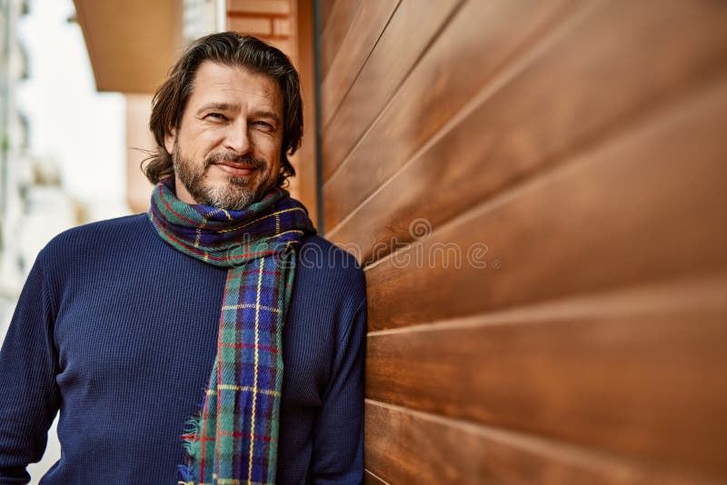 Middle Age Handsome Man Smiling Leaning on the Wall Stock Photo - Image ...