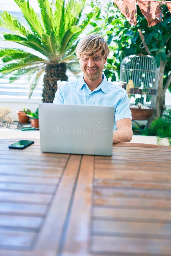 Middle Age Handsome Man Working at Home Using Computer Laptop Stock ...