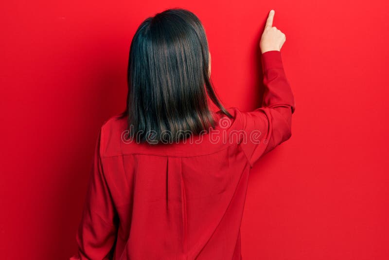 Middle Age Hispanic Woman Wearing Casual Clothes Posing Backwards