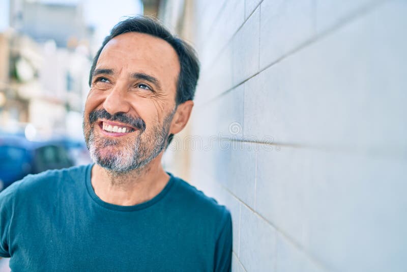 Middle Age Man with Beard Smiling Happy Outdoors Leaning on the Wall ...