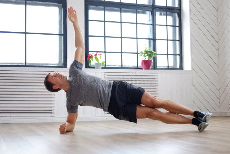 Middle Age Man Doing Fitness Workouts. Stock Image - Image of picking ...