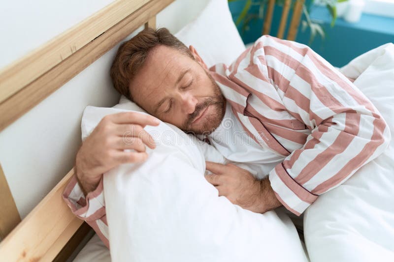 Middle Age Man Lying on Bed Sleeping at Bedroom Stock Photo - Image of ...