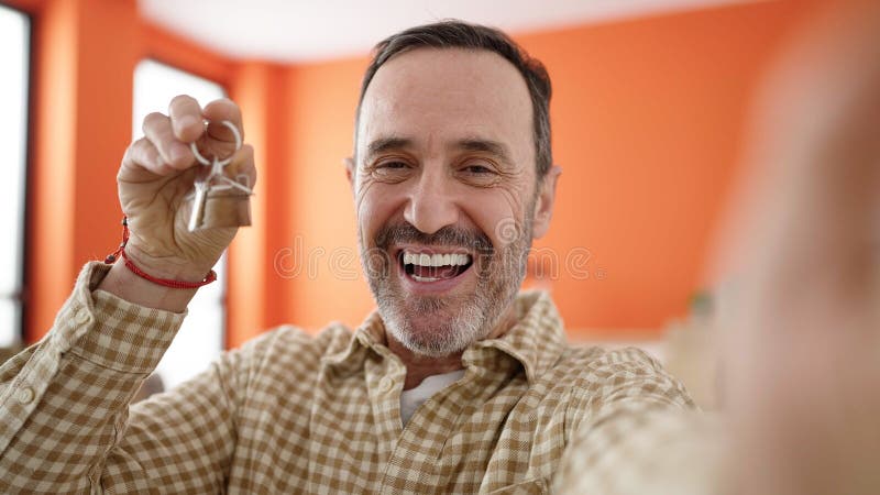 Middle Age Man Make Selfie by Camera Holding Key at New Home Stock ...