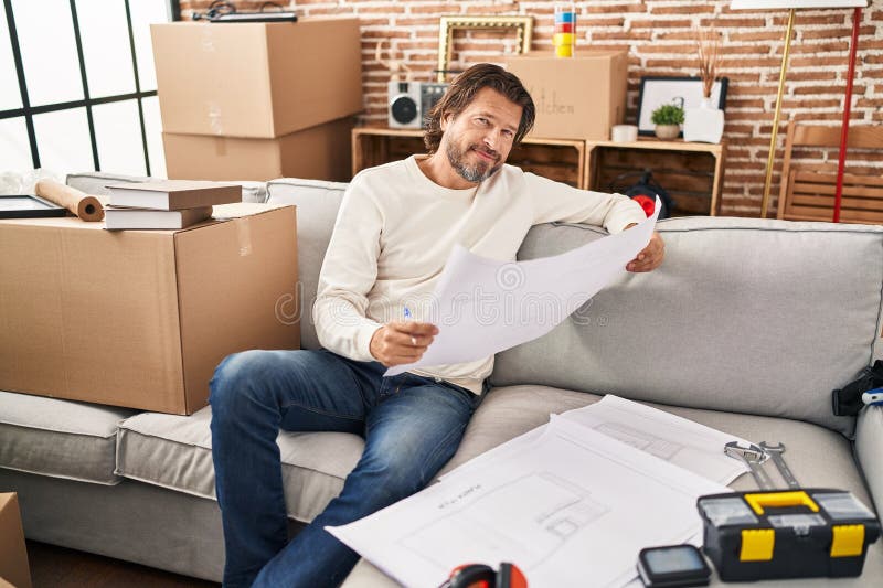 Handsome Middle Age Man Working at Small Business Ecommerce Angry and ...