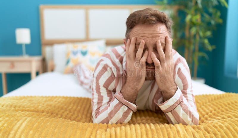 Middle Age Man Stressed Lying on Bed at Bedroom Stock Photo - Image of ...