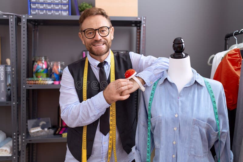 Middle Age Man Tailor Smiling Confident Leaning on Manikin at Atelier ...