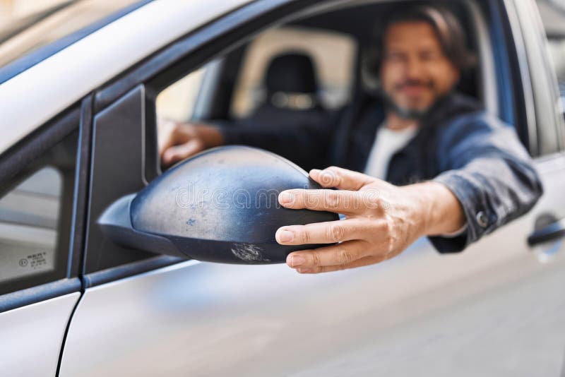 Middle Age Man Touching Rearview Sitting on Car at Street Stock Image ...