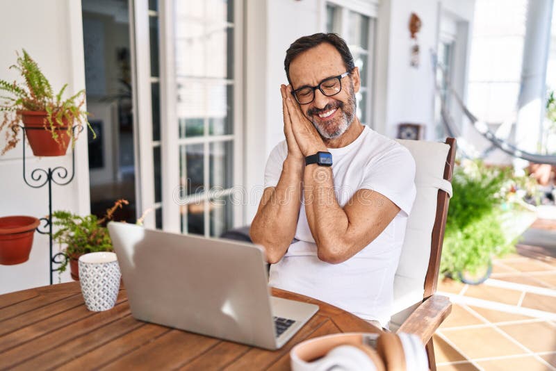 Middle Age Man Using Computer Laptop at Home Sleeping Tired Dreaming ...
