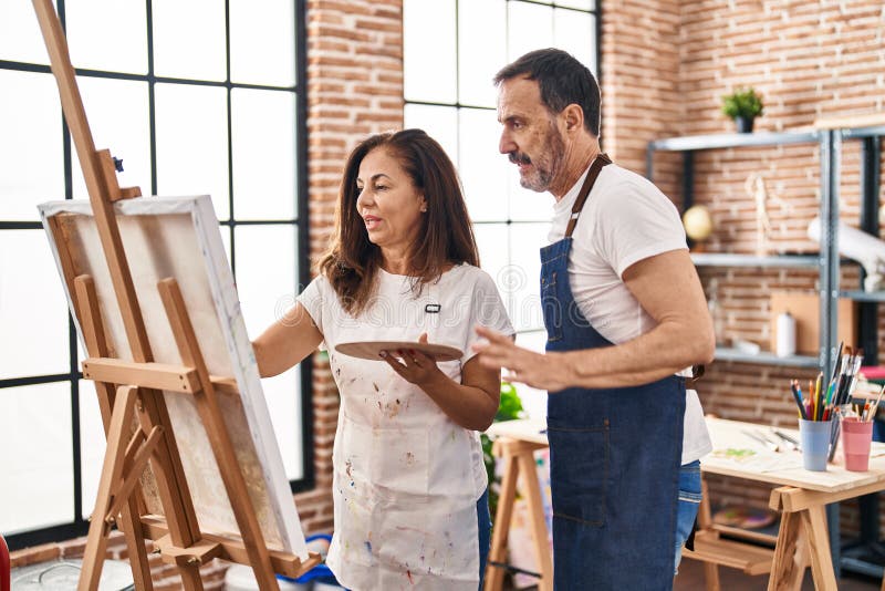 Middle Age Man and Woman Artists Drawing at Art Studio Stock Photo ...