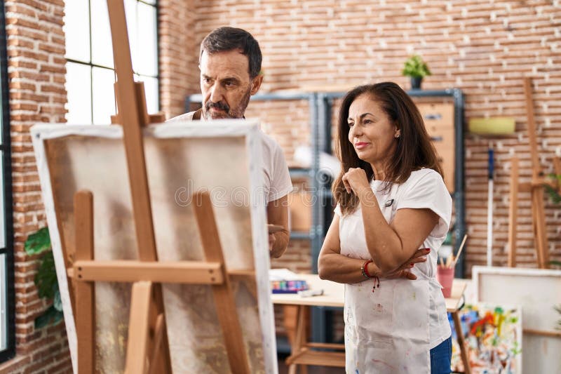 Middle Age Man and Woman Artists Drawing at Art Studio Stock Image ...