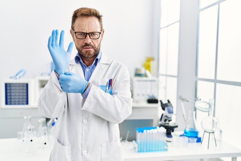 Middle Age Man Working at Scientist Laboratory Clueless and Confused ...