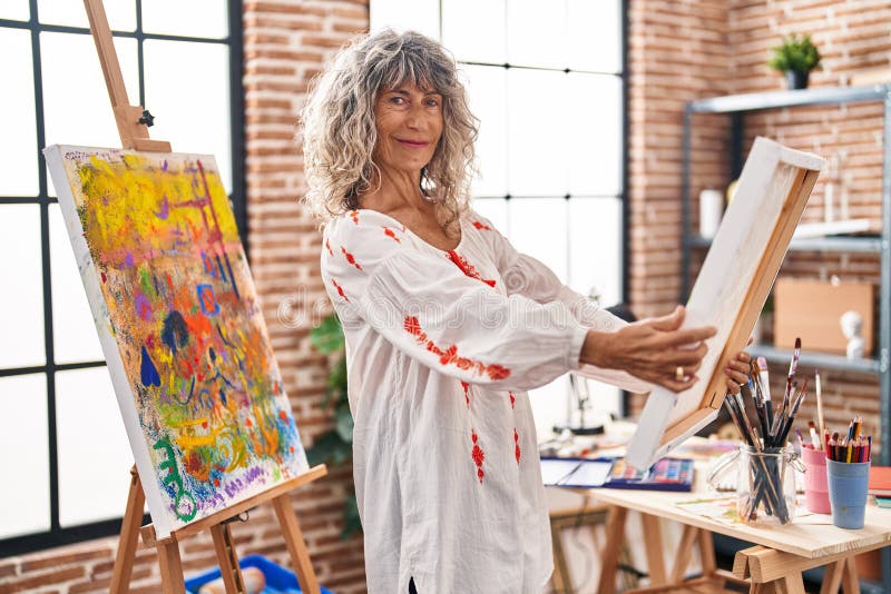 Middle Age Woman Artist Looking Draw at Art Studio Stock Photo - Image ...