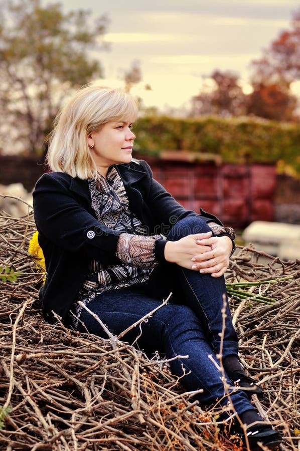 Middle age woman in fall stock photo. Image of coat - 162404242