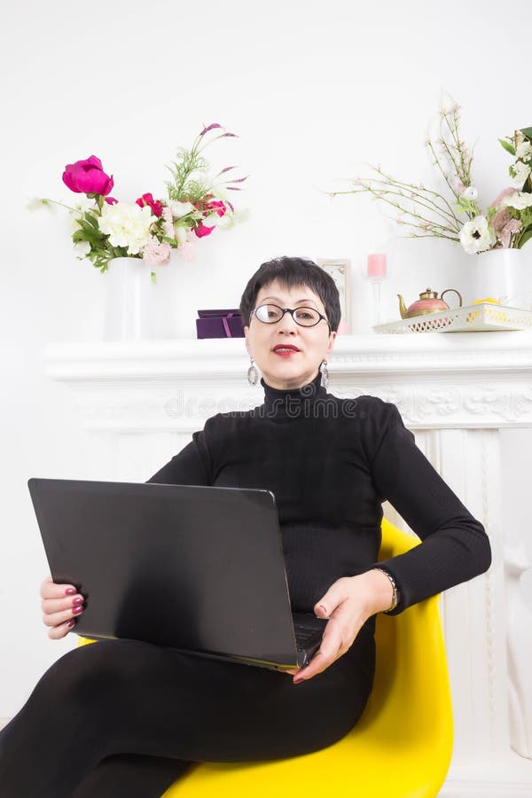 Middle Age Woman on Her Laptop Computer Stock Photo - Image of ...